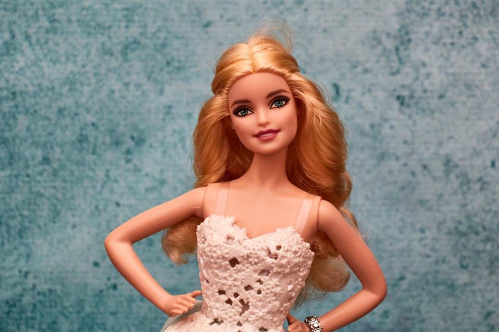 Celebrate the season with the 2016 Holiday Barbie Doll Divine Lifestyle